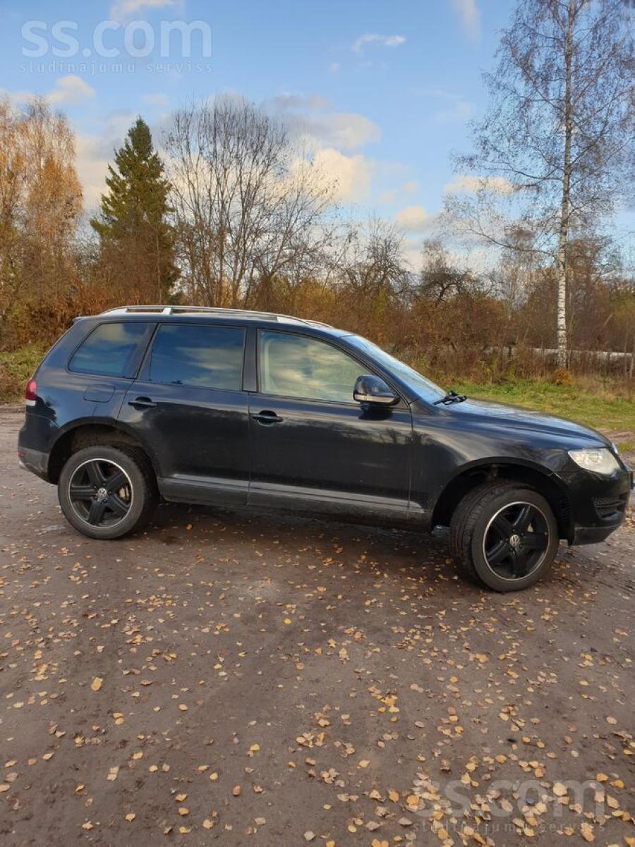 Melns Volkswagen Touareg 2008 Rīga, ar dzinēja tilpumu 3.00 L un nobraukumu 280 tūkst. km par 4750 €, foto 5 vietnē AUTOMOTO.COM.LV