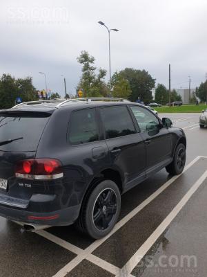 Melns Volkswagen Touareg 2008 Rīga, ar dzinēja tilpumu 3.00 L un nobraukumu 280 tūkst. km par 4750 €, foto 12 vietnē AUTOMOTO.COM.LV