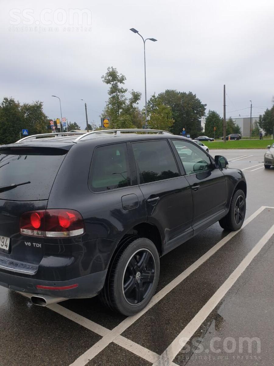 Melns Volkswagen Touareg 2008 Rīga, ar dzinēja tilpumu 3.00 L un nobraukumu 280 tūkst. km par 4750 €, foto 12 vietnē AUTOMOTO.COM.LV
