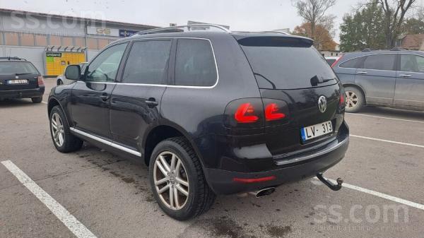 Black Volkswagen Touareg 2008 in Ludza, with an engine capacity of 3.00 L and mileage of 321 thousand km for 3800 €, photo 7 on AUTOMOTO.COM.LV