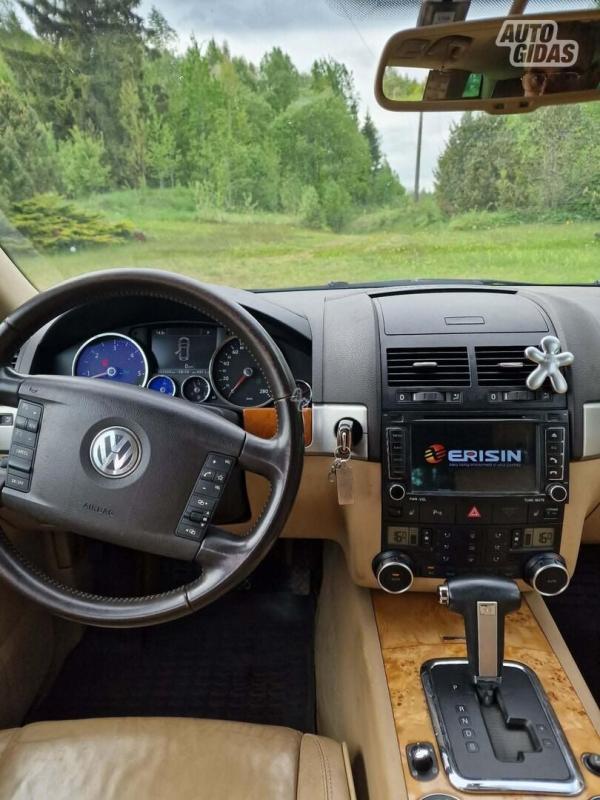 Black Volkswagen Touareg 2009 in Vilnius, with an engine capacity of 3.00 L and mileage of 303 thousand km for 6900 €, photo 6 on AUTOMOTO.COM.LV