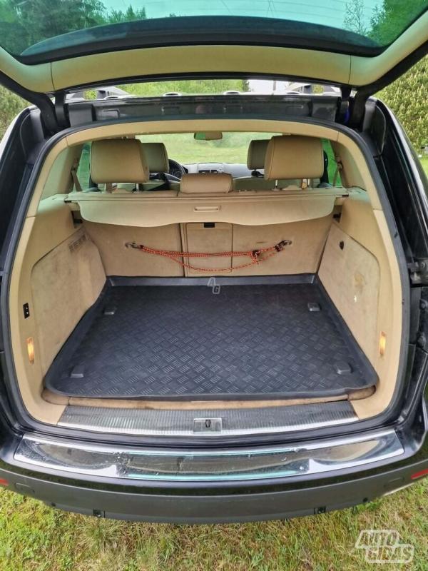 Black Volkswagen Touareg 2009 in Vilnius, with an engine capacity of 3.00 L and mileage of 303 thousand km for 6900 €, photo 9 on AUTOMOTO.COM.LV