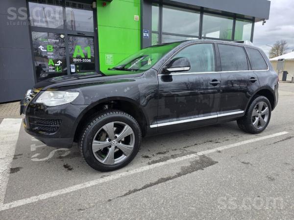 Black Volkswagen Touareg 2009 in Riga, with an engine capacity of 3.00 L and mileage of 212 thousand km for 6390 €, photo 1 on AUTOMOTO.COM.LV