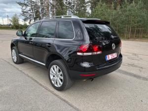 Melns Volkswagen Touareg 2009 Rīga, ar dzinēja tilpumu 2.50 L un nobraukumu 211 tūkst. km par 6650 €, foto 7 vietnē AUTOMOTO.COM.LV