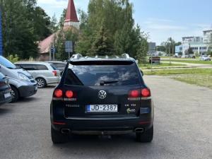 Black Volkswagen Touareg 2009 in Riga, with an engine capacity of 3.00 L and mileage of 287 thousand km for 5990 €, photo 7 on AUTOMOTO.COM.LV