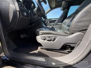Black Volkswagen Touareg 2009 in Riga, with an engine capacity of 3.00 L and mileage of 386 thousand km for 7900 €, photo 11 on AUTOMOTO.COM.LV