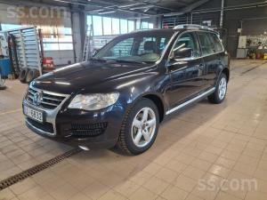 Melns Volkswagen Touareg 2009 Valmiera, ar dzinēja tilpumu 3.00 L un nobraukumu 298 tūkst. km par 4300 €, foto  vietnē AUTOMOTO.COM.LV