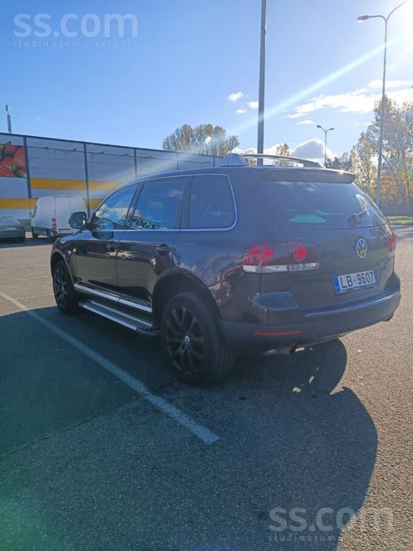 Melns Volkswagen Touareg 2009 Rīga, ar dzinēja tilpumu 3.00 L un nobraukumu 266 tūkst. km par 5500 €, foto 6 vietnē AUTOMOTO.COM.LV