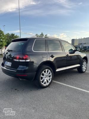 Black Volkswagen Touareg 2009 in Vilnius, with an engine capacity of 3.00 L and mileage of 259 thousand km for 7850 €, photo 4 on AUTOMOTO.COM.LV