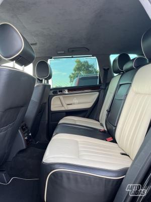 Black Volkswagen Touareg 2009 in Vilnius, with an engine capacity of 3.00 L and mileage of 259 thousand km for 7850 €, photo 10 on AUTOMOTO.COM.LV