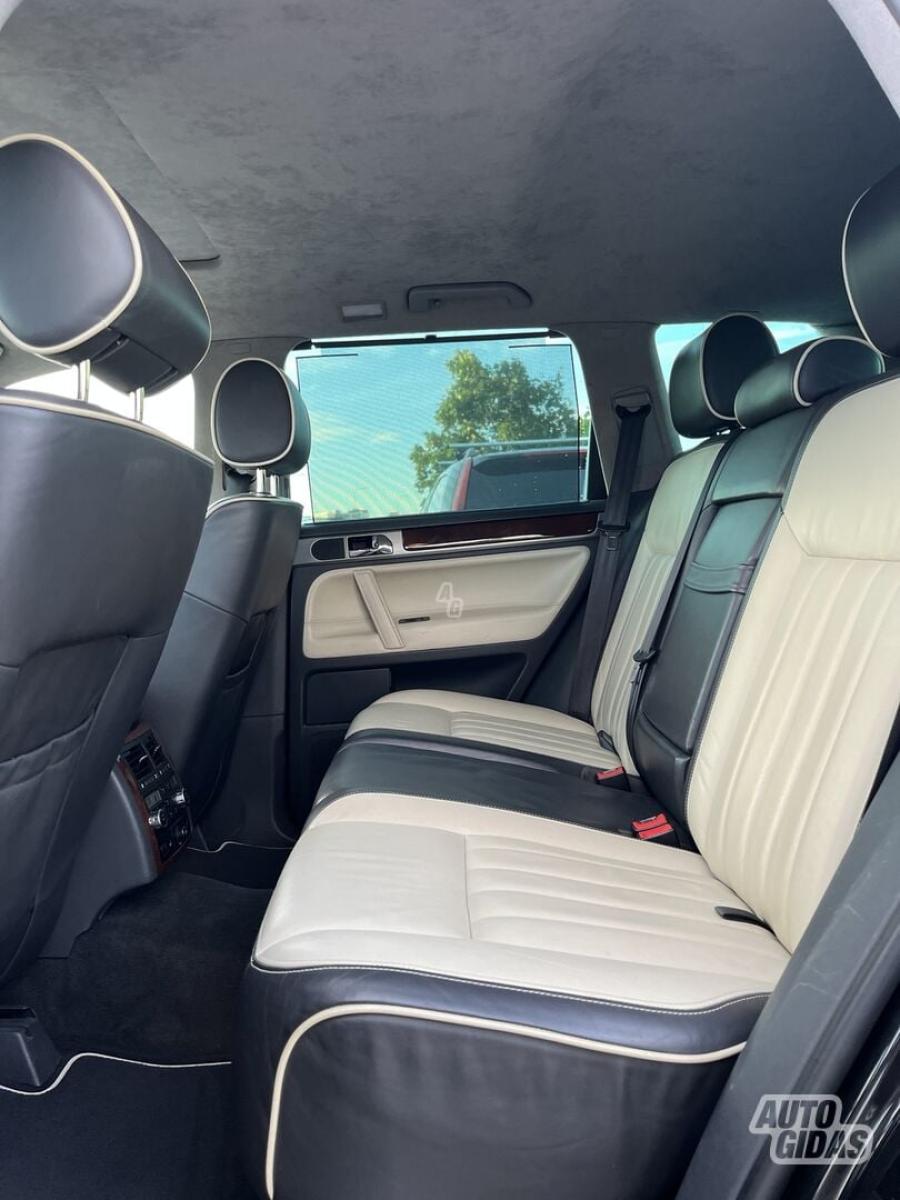 Black Volkswagen Touareg 2009 in Vilnius, with an engine capacity of 3.00 L and mileage of 259 thousand km for 7850 €, photo 10 on AUTOMOTO.COM.LV