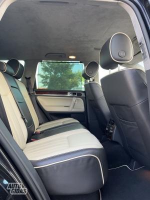 Black Volkswagen Touareg 2009 in Vilnius, with an engine capacity of 3.00 L and mileage of 259 thousand km for 7850 €, photo 12 on AUTOMOTO.COM.LV