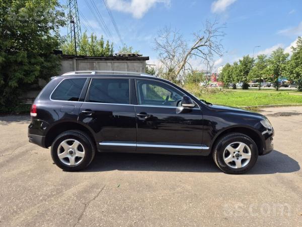 Melns Volkswagen Touareg 2009 Rīga, ar dzinēja tilpumu 3.00 L un nobraukumu 383 tūkst. km par 4890 €, foto 4 vietnē AUTOMOTO.COM.LV