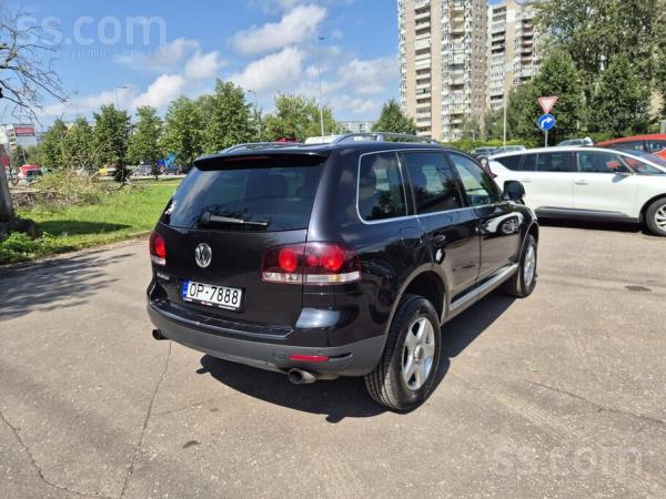 Melns Volkswagen Touareg 2009 Rīga, ar dzinēja tilpumu 3.00 L un nobraukumu 383 tūkst. km par 4890 €, foto 5 vietnē AUTOMOTO.COM.LV