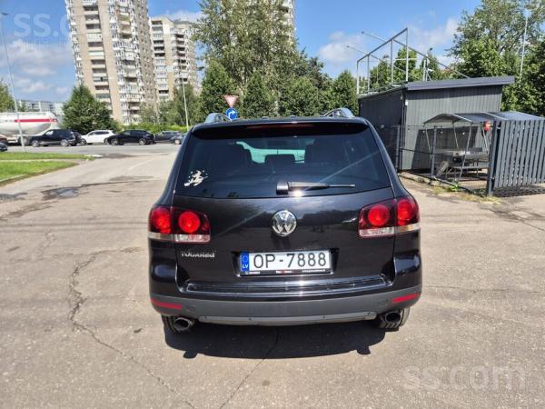 Melns Volkswagen Touareg 2009 Rīga, ar dzinēja tilpumu 3.00 L un nobraukumu 383 tūkst. km par 4890 €, foto 6 vietnē AUTOMOTO.COM.LV