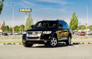 Black Volkswagen Touareg 2009 in Riga, with an engine capacity of 3.00 L and mileage of 383 thousand km for 4890 €, photo  on AUTOMOTO.COM.LV