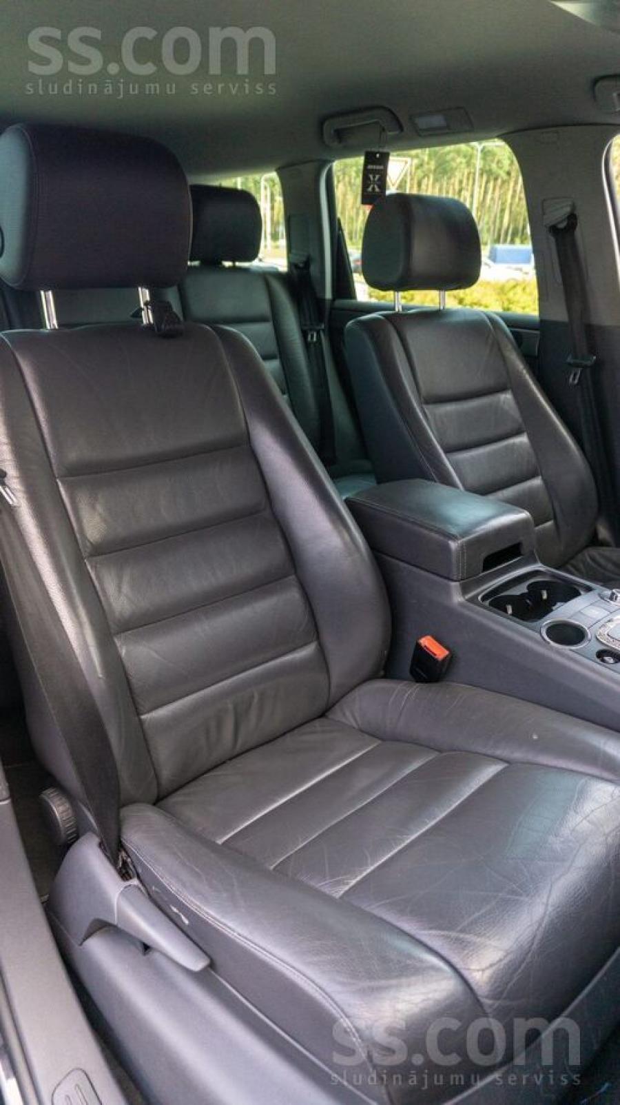 Black Volkswagen Touareg 2009 in Riga, with an engine capacity of 3.00 L and mileage of 383 thousand km for 5290 €, photo 27 on AUTOMOTO.COM.LV