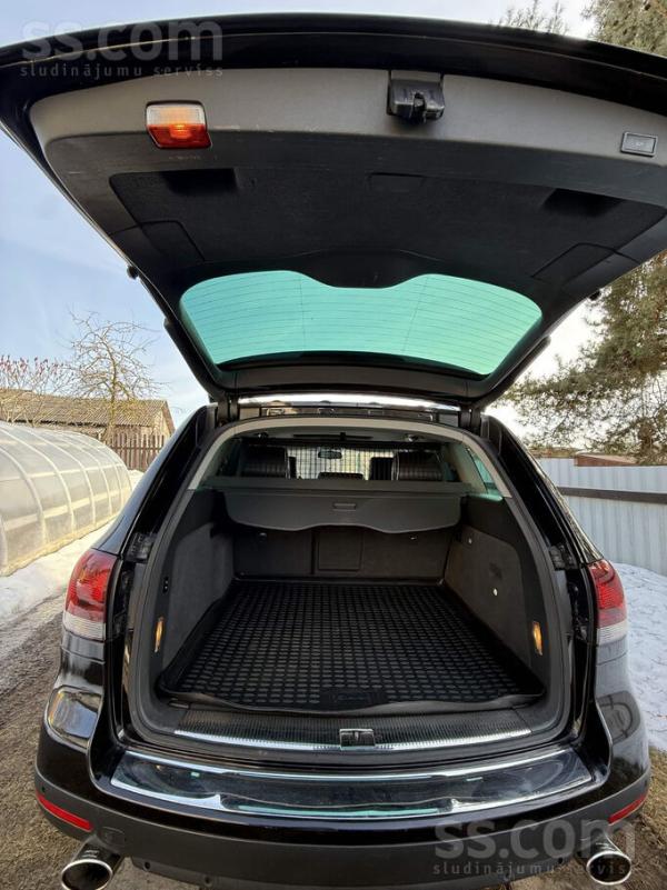 Black Volkswagen Touareg 2009 in Jelgava, with an engine capacity of 3.00 L and mileage of 218 thousand km for 6900 €, photo 11 on AUTOMOTO.COM.LV