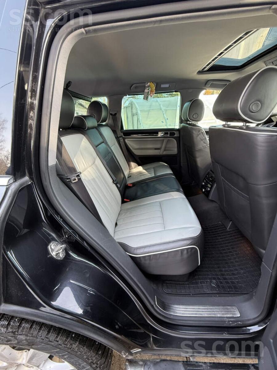 Melns Volkswagen Touareg 2009 Jelgava, ar dzinēja tilpumu 3.00 L un nobraukumu 218 tūkst. km par 6900 €, foto 12 vietnē AUTOMOTO.COM.LV