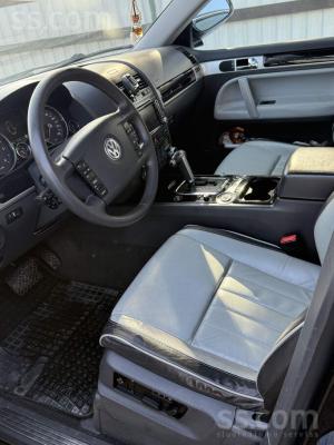 Melns Volkswagen Touareg 2009 Jelgava, ar dzinēja tilpumu 3.00 L un nobraukumu 218 tūkst. km par 6900 €, foto 15 vietnē AUTOMOTO.COM.LV