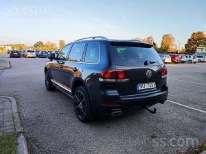 Melns Volkswagen Touareg 2009 Jelgava, ar dzinēja tilpumu 3.00 L un nobraukumu 240 tūkst. km par 5950 €, foto 8 vietnē AUTOMOTO.COM.LV