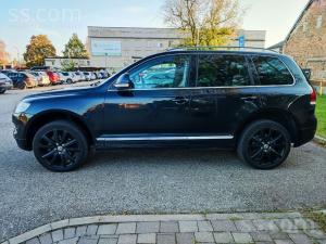 Melns Volkswagen Touareg 2009 Jelgava, ar dzinēja tilpumu 3.00 L un nobraukumu 240 tūkst. km par 5950 €, foto 10 vietnē AUTOMOTO.COM.LV