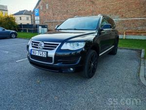 Melns Volkswagen Touareg 2009 Jelgava, ar dzinēja tilpumu 3.00 L un nobraukumu 240 tūkst. km par 5950 €, foto 12 vietnē AUTOMOTO.COM.LV