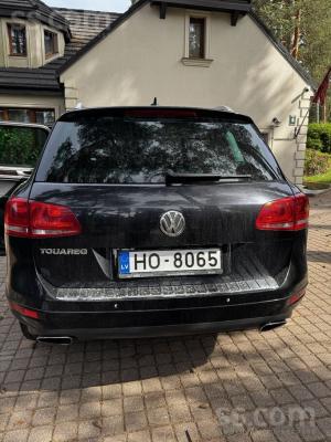 Black Volkswagen Touareg 2010 in Riga, with an engine capacity of 3.00 L and mileage of 300 thousand km for 9300 €, photo 12 on AUTOMOTO.COM.LV