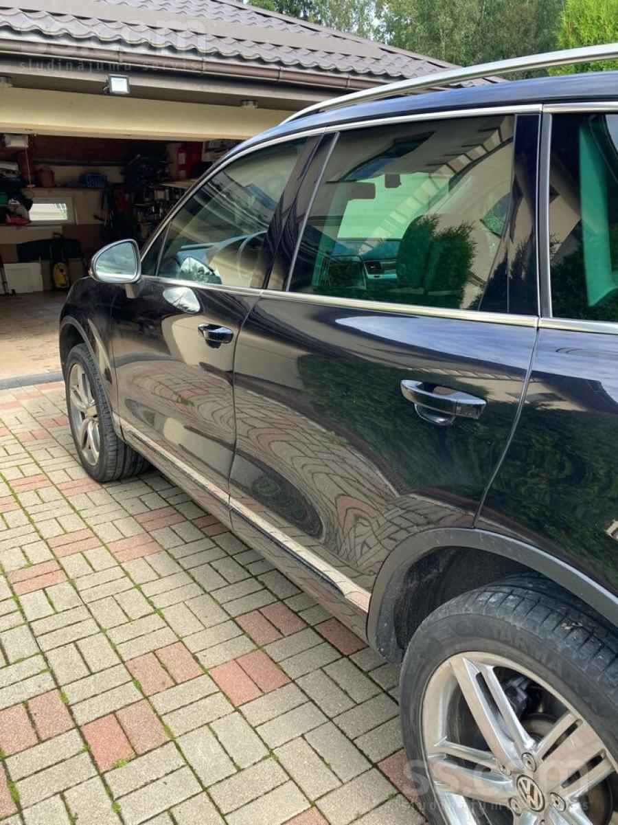 Melns Volkswagen Touareg 2010 Rīga, ar dzinēja tilpumu 3.00 L un nobraukumu 277 tūkst. km par 9500 €, foto 4 vietnē AUTOMOTO.COM.LV