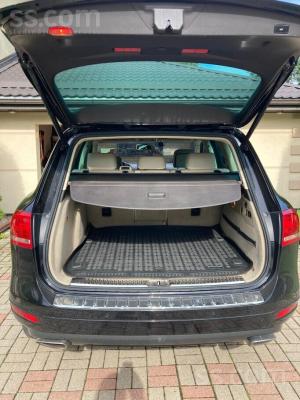 Melns Volkswagen Touareg 2010 Rīga, ar dzinēja tilpumu 3.00 L un nobraukumu 277 tūkst. km par 9500 €, foto 6 vietnē AUTOMOTO.COM.LV