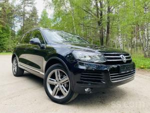 Black Volkswagen Touareg 2010 in Riga, with an engine capacity of 3.00 L and mileage of 0 thousand km for 10990 €, photo  on AUTOMOTO.COM.LV