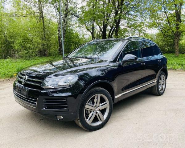Black Volkswagen Touareg 2010 in Riga, with an engine capacity of 3.00 L and mileage of 0 thousand km for 10990 €, photo 3 on AUTOMOTO.COM.LV