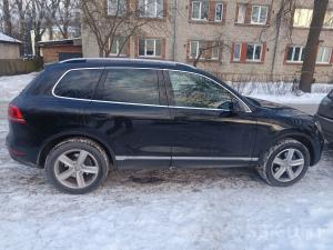 Black Volkswagen Touareg 2010 in Riga, with an engine capacity of 3.00 L and mileage of 320 thousand km for 10800 €, photo  on AUTOMOTO.COM.LV