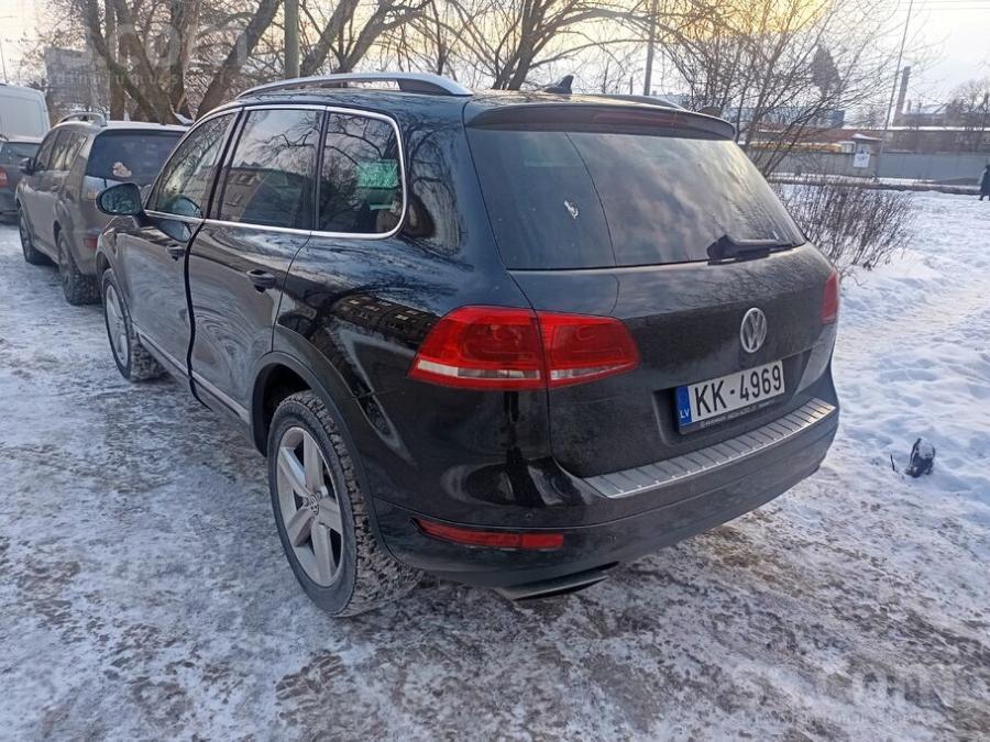 Melns Volkswagen Touareg 2010 Rīga, ar dzinēja tilpumu 3.00 L un nobraukumu 320 tūkst. km par 10800 €, foto 4 vietnē AUTOMOTO.COM.LV