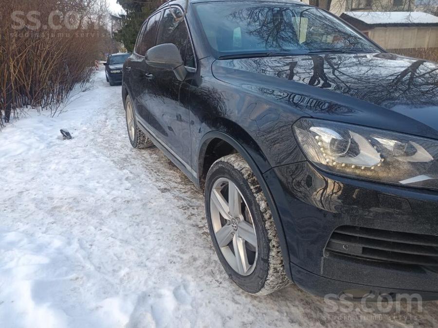 Melns Volkswagen Touareg 2010 Rīga, ar dzinēja tilpumu 3.00 L un nobraukumu 320 tūkst. km par 10800 €, foto 5 vietnē AUTOMOTO.COM.LV