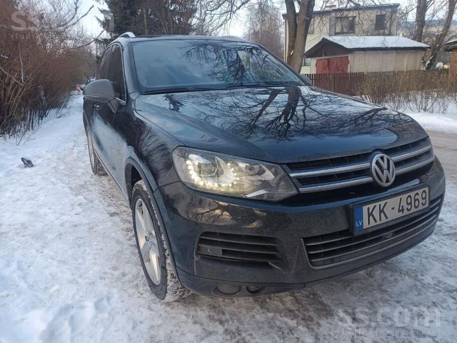 Melns Volkswagen Touareg 2010 Rīga, ar dzinēja tilpumu 3.00 L un nobraukumu 320 tūkst. km par 10800 €, foto 6 vietnē AUTOMOTO.COM.LV