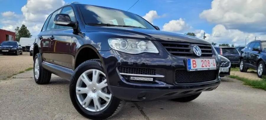 Melns Volkswagen Touareg 2010 Rīga, ar dzinēja tilpumu 3.00 L un nobraukumu 235 tūkst. km par 9900 €, foto 12 vietnē AUTOMOTO.COM.LV
