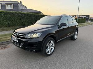 Black Volkswagen Touareg 2010 in Vilkaviskis, with an engine capacity of 3.00 L and mileage of 256 thousand km for 10700 €, photo  on AUTOMOTO.COM.LV