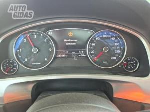 Black Volkswagen Touareg 2010 in Vilnius, with an engine capacity of 3.00 L and mileage of 221 thousand km for 7800 €, photo 11 on AUTOMOTO.COM.LV