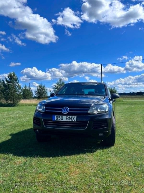 Melns Volkswagen Touareg 2010 Tallina, ar dzinēja tilpumu 3.00 L un nobraukumu 404 tūkst. km par 8500 €, foto 2 vietnē AUTOMOTO.COM.LV