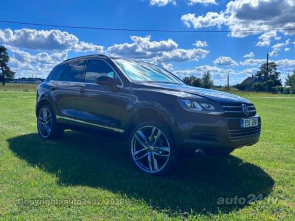 Melns Volkswagen Touareg 2010 Tallina, ar dzinēja tilpumu 3.00 L un nobraukumu 404 tūkst. km par 8500 €, foto 4 vietnē AUTOMOTO.COM.LV