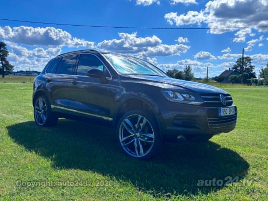 Black Volkswagen Touareg 2010 in Tallinn, with an engine capacity of 3.00 L and mileage of 404 thousand km for 8500 €, photo 5 on AUTOMOTO.COM.LV