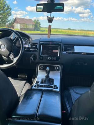 Black Volkswagen Touareg 2010 in Tallinn, with an engine capacity of 3.00 L and mileage of 404 thousand km for 8500 €, photo 7 on AUTOMOTO.COM.LV