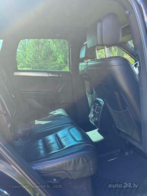 Black Volkswagen Touareg 2010 in Tallinn, with an engine capacity of 3.00 L and mileage of 404 thousand km for 8500 €, photo 8 on AUTOMOTO.COM.LV