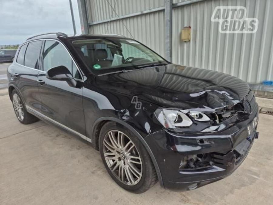 Melns Volkswagen Touareg 2010 Viļņa, ar dzinēja tilpumu 3.00 L un nobraukumu 221 tūkst. km par 7990 €, foto 4 vietnē AUTOMOTO.COM.LV