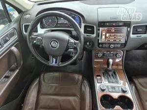 Melns Volkswagen Touareg 2010 Viļņa, ar dzinēja tilpumu 3.00 L un nobraukumu 221 tūkst. km par 7990 €, foto 7 vietnē AUTOMOTO.COM.LV