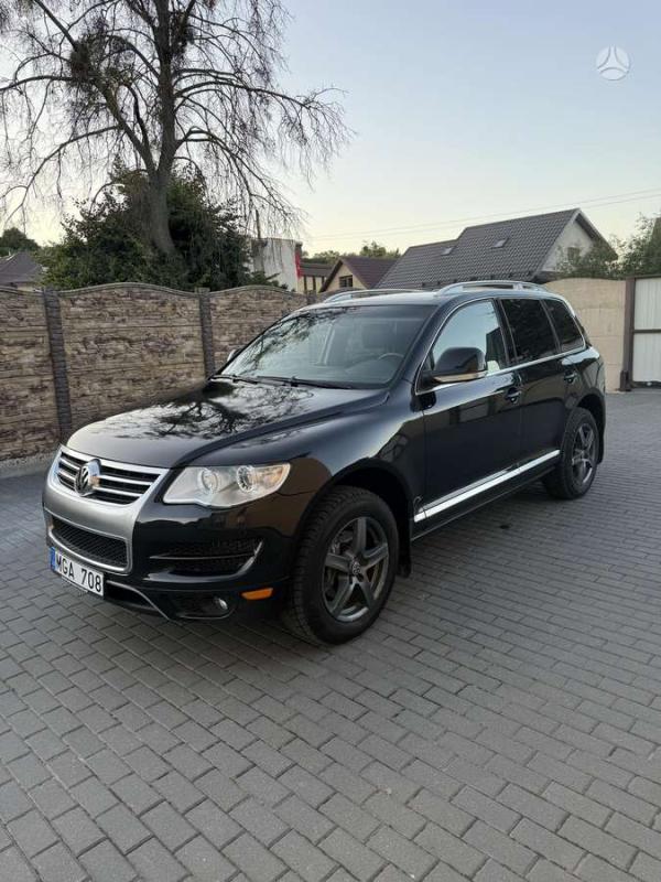 Black Volkswagen Touareg 2010 in Kaunas, with an engine capacity of 2.97 L and mileage of 244 thousand km for 6500 €, photo 6 on AUTOMOTO.COM.LV