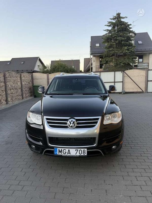 Black Volkswagen Touareg 2010 in Kaunas, with an engine capacity of 2.97 L and mileage of 244 thousand km for 6500 €, photo 7 on AUTOMOTO.COM.LV