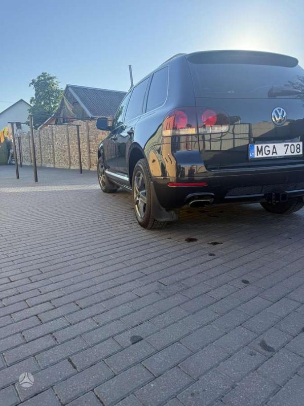 Black Volkswagen Touareg 2010 in Kaunas, with an engine capacity of 2.97 L and mileage of 244 thousand km for 6500 €, photo 8 on AUTOMOTO.COM.LV