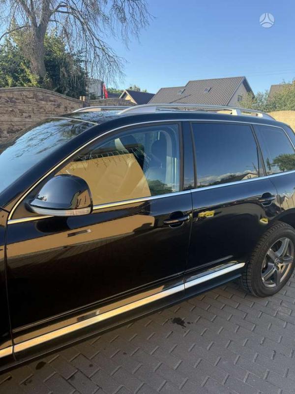 Black Volkswagen Touareg 2010 in Kaunas, with an engine capacity of 2.97 L and mileage of 244 thousand km for 6500 €, photo 10 on AUTOMOTO.COM.LV